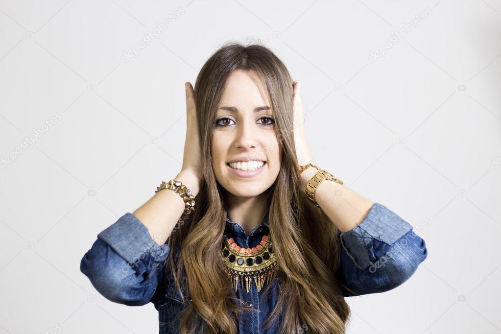 Covered ears girl Stock Photo by ©Kuassar 24327557