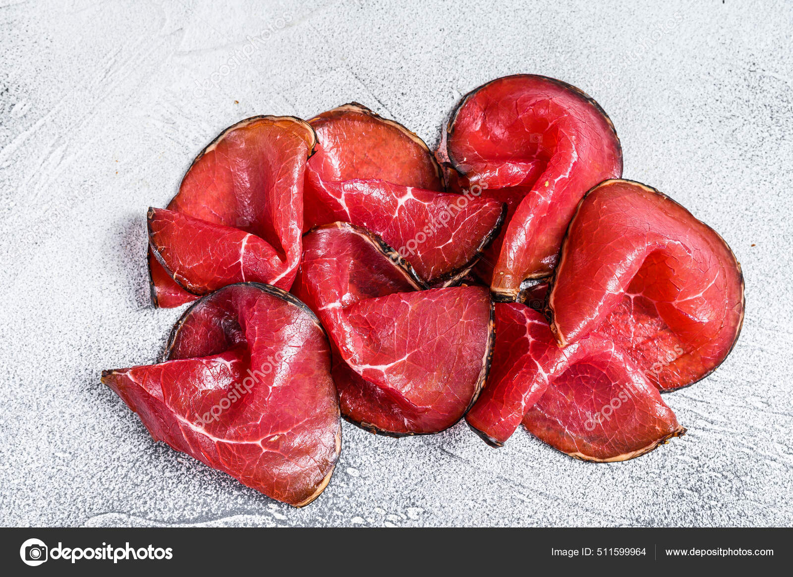 Smoked bresaola beef cut pieces, Italian Antipasti. White background ...