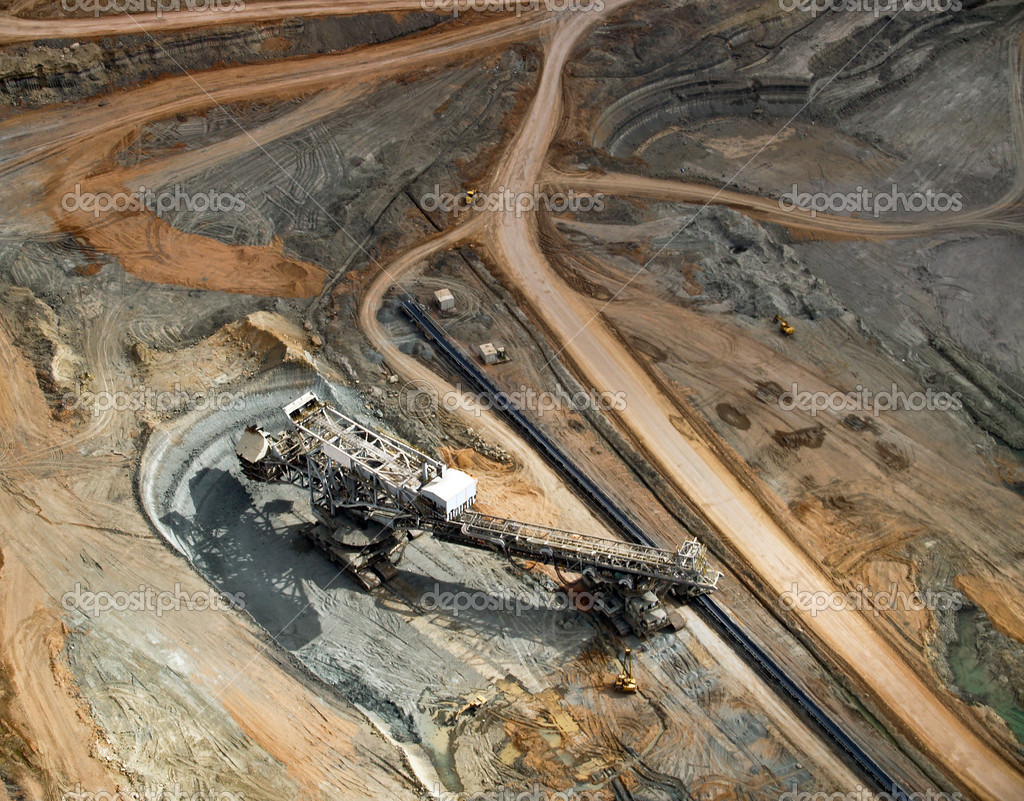Large excavator in surface coal mine, aerial view — Stock Photo ...