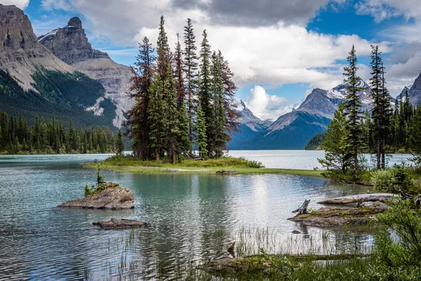 Soft light over the enchanting Spirit Island and surrounding mountains ...