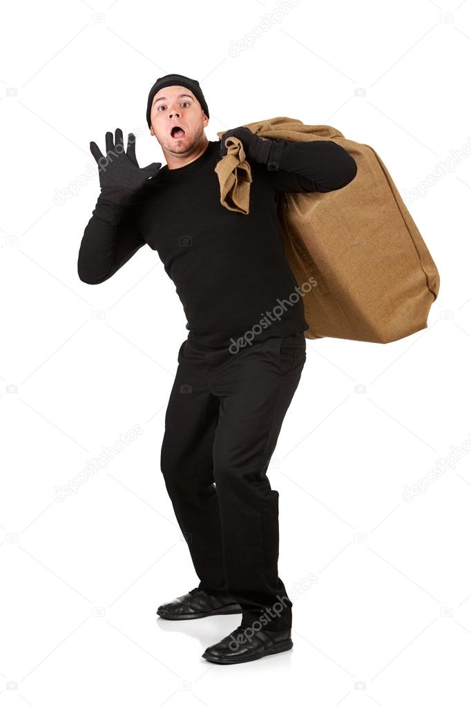 Burglar: Man Caught with Stolen Goods Stock Photo by ©sjlocke 26785477