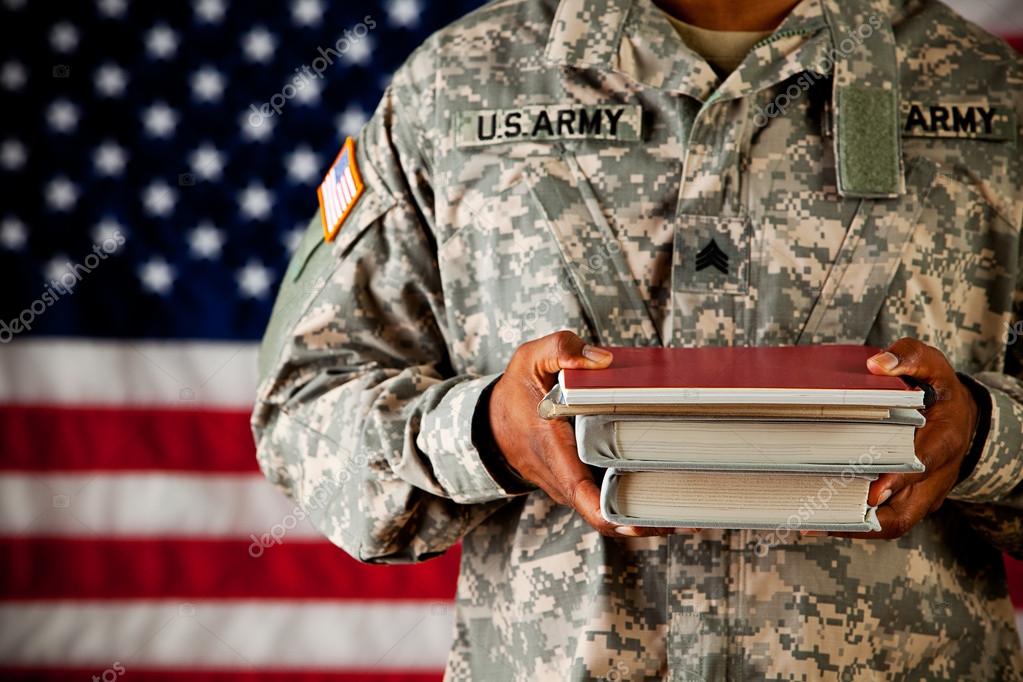 Soldier: Student Holding Stack of School Books — Stock Photo © sjlocke ...