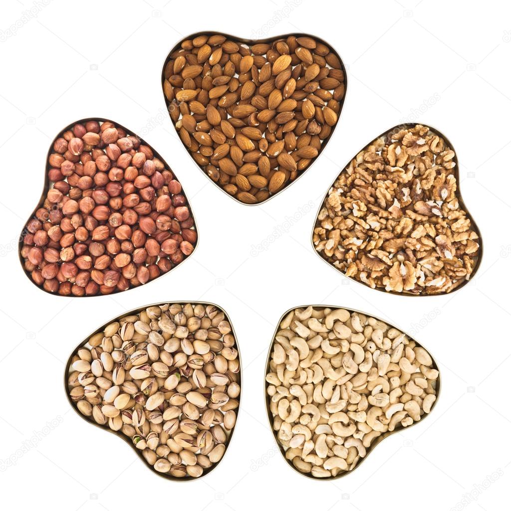 Nut mix in a heart shaped boxes Stock Photo by ©exopixel 25151201