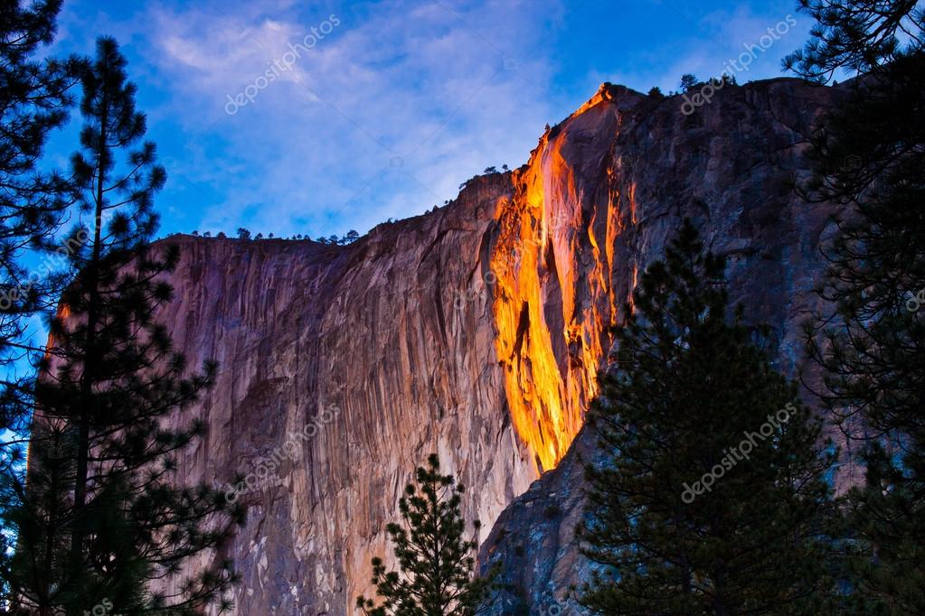 Horsetail falls lit up during sunset in Yosemite National Park ...