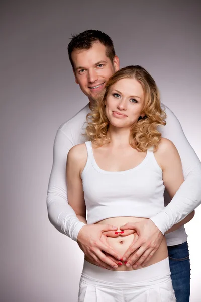 Pregnant belly heart Stock Photos, Royalty Free Pregnant belly heart ...