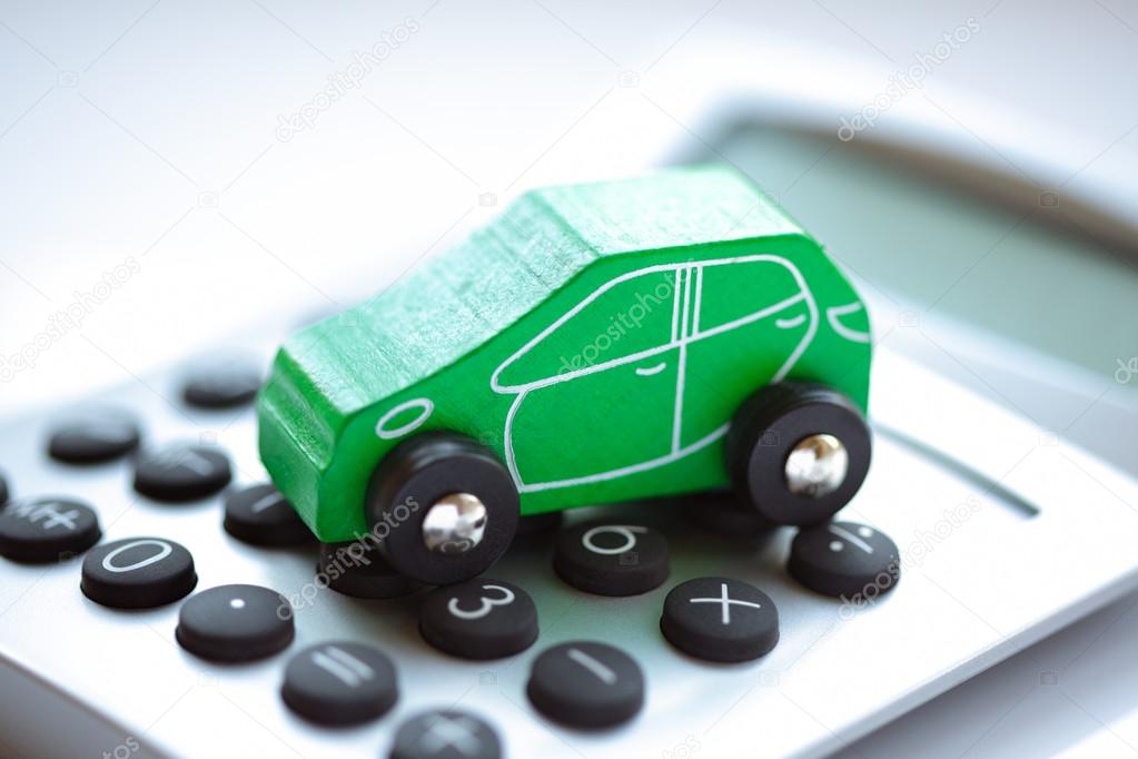 Toy car and calculator — Stock Photo © BrianAJackson #24503487