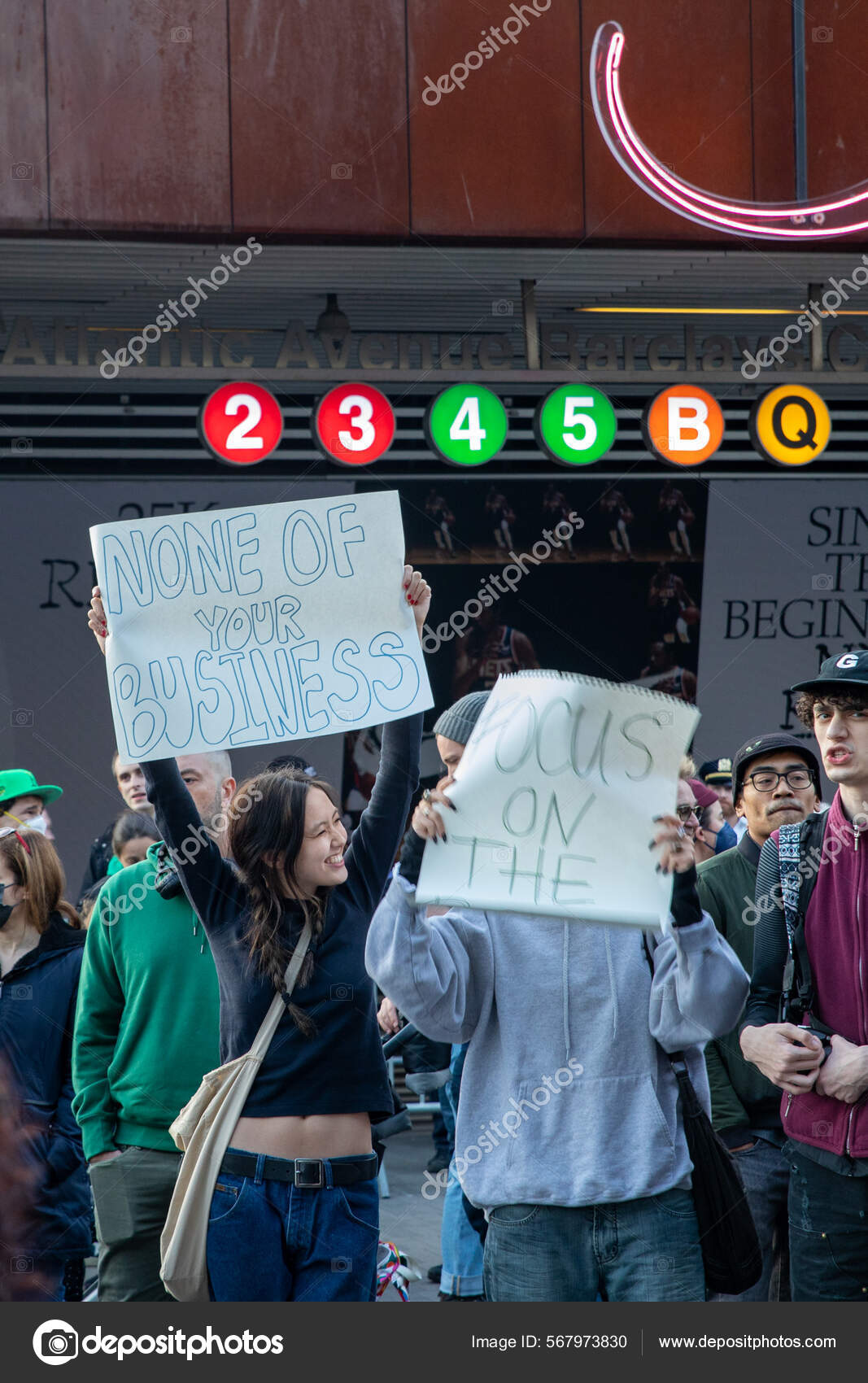 Two Young Female Holding Cardboard Sign Words None Your Business ...