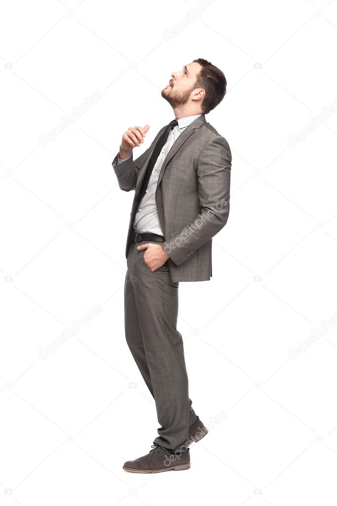 Elegant man looking up Stock Photo by ©brasoveanub 41188557