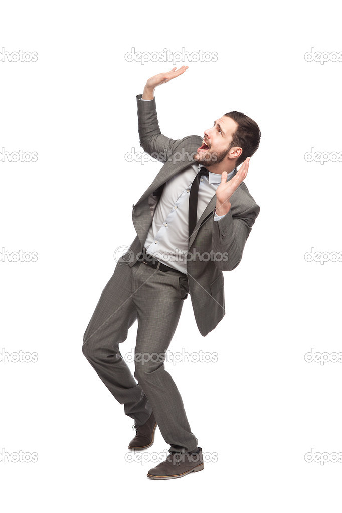 Elegant man dodges a falling top Stock Photo by ©brasoveanub 41188587