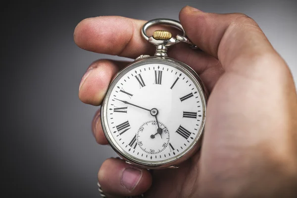 Human hand holding stopwatch — Stock Photo © Rangizzz #9570274