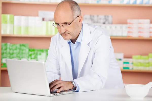 Pharmacist with laptop Stock Photos, Royalty Free Pharmacist with ...