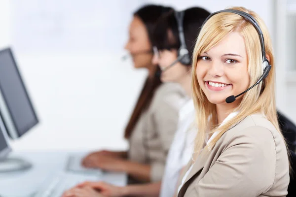 Young Customer Service Executive Wearing Headset In Office - Stock ...