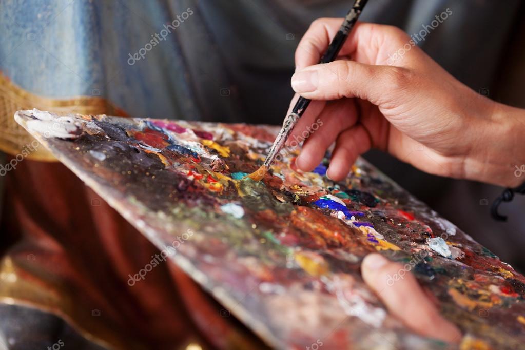 Hand Mixing Paint On Palette — Stock Photo © racorn #26899299