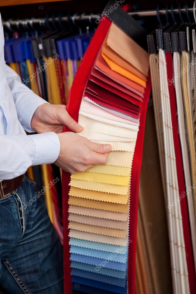 Interior designer with colour swatches of fabrics — Stock Photo ...