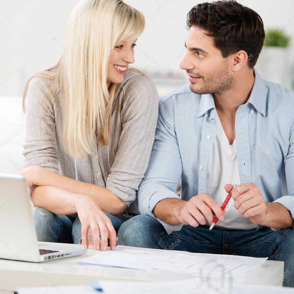 Young couple having a discussion — Stock Photo © racorn #28149295 Young couple having a discussion — Stock Photo © racorn #28149295