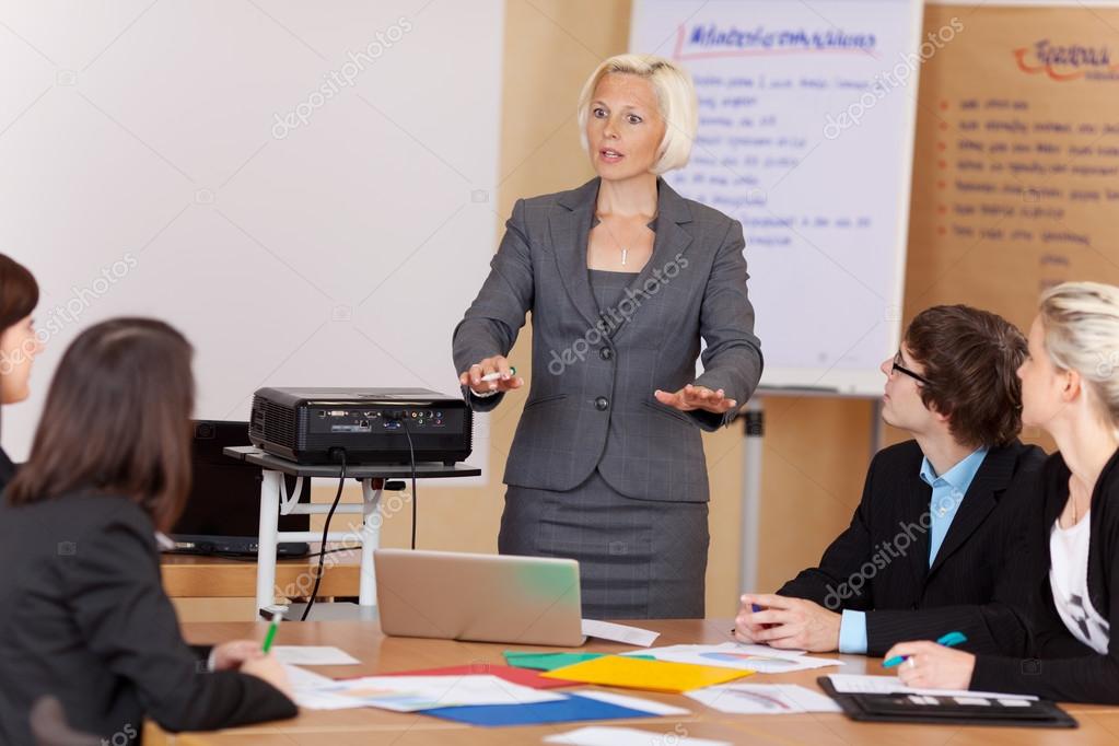 Woman giving a corporate training class — Stock Photo © racorn #29707273