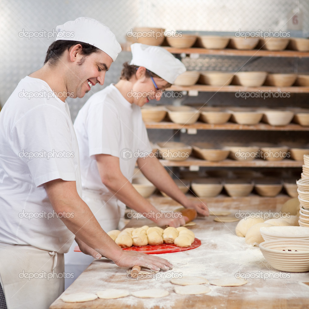 Dos trabajadores de panadería — Foto de stock © racorn #50594899