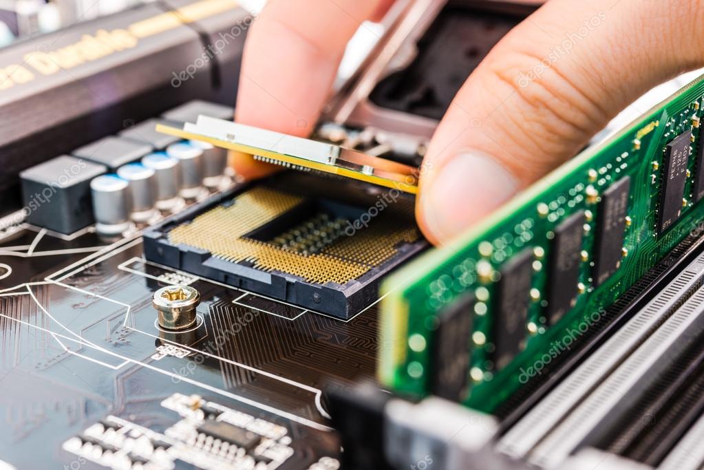 Installation of computer memory and processor — Stock Photo © Mark800 ...