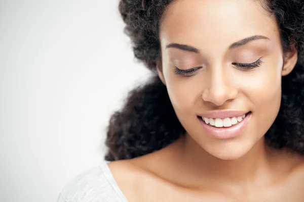 Smiling African Woman Stock Photo by ©luminastock 25289871