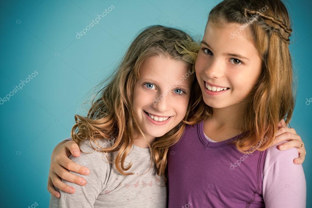 Two Girls Smiling Stock Photo by ©luminastock 34743421