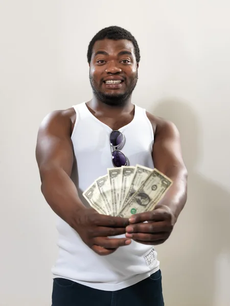 Black guy with money Stock Photo by ©Stockdonkey 30904217