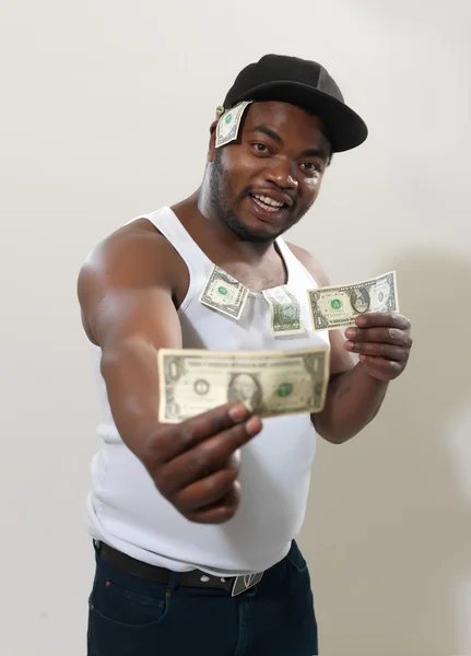 Black guy with money Stock Photo by ©Stockdonkey 30904217