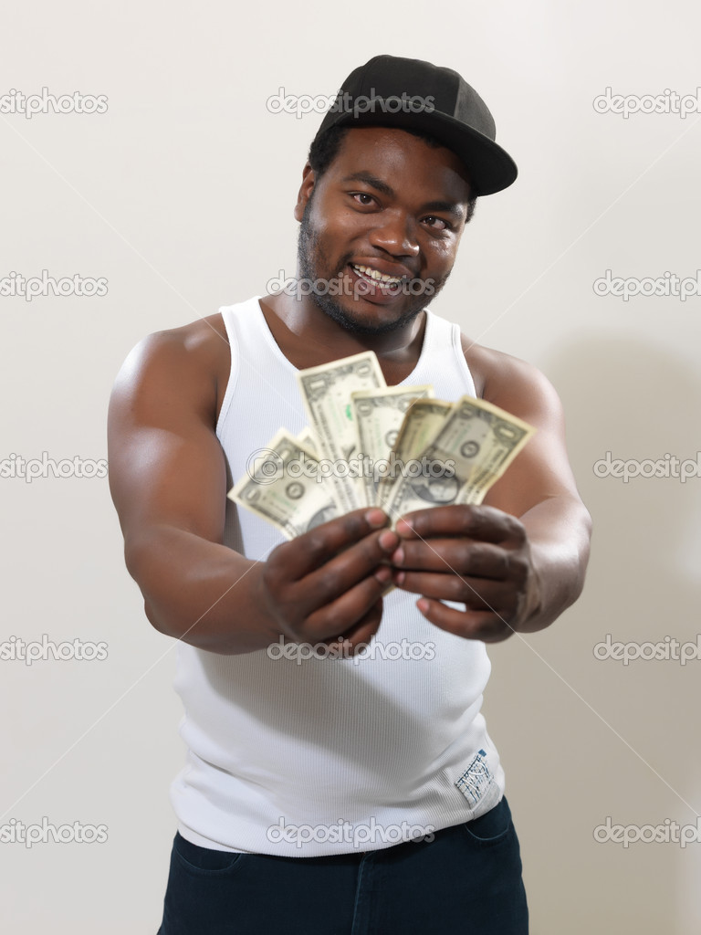 Black guy with money Stock Photo by ©Stockdonkey 30904217