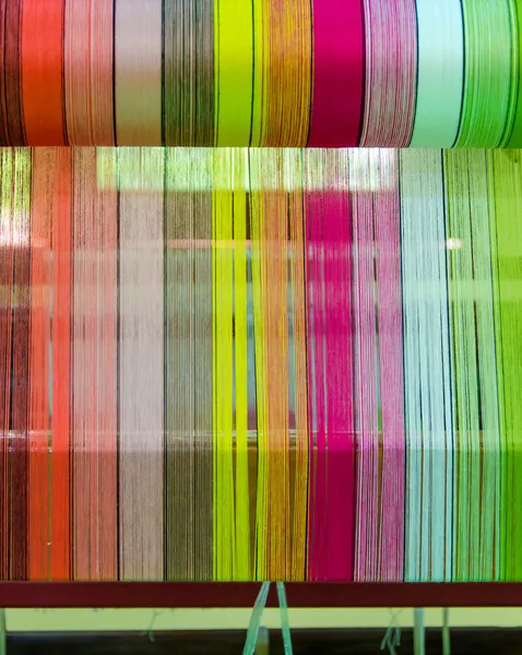 Yarn pattern is set up on the loom bench and ready to weave - Stock ...