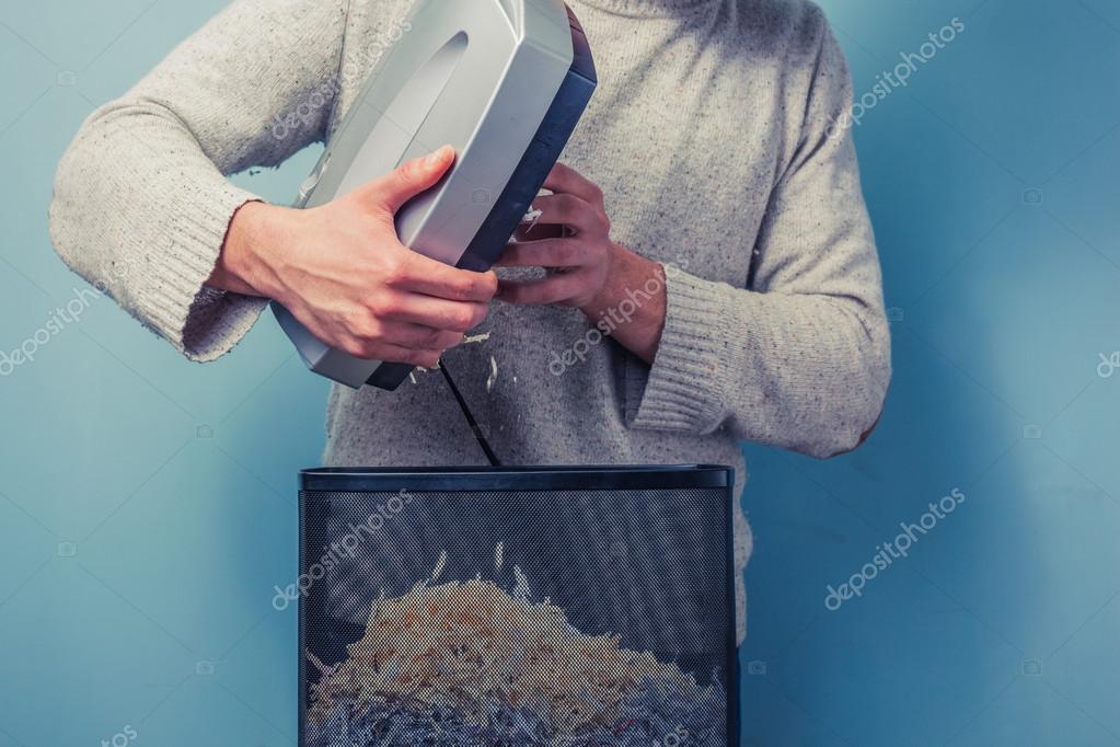 Man with shredder Stock Photo by ©lofilolo 41035179