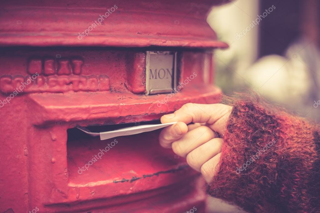 Woman posting letter — Stock Photo © lofilolo #41371071 Woman posting letter — Stock Photo © lofilolo #41371071