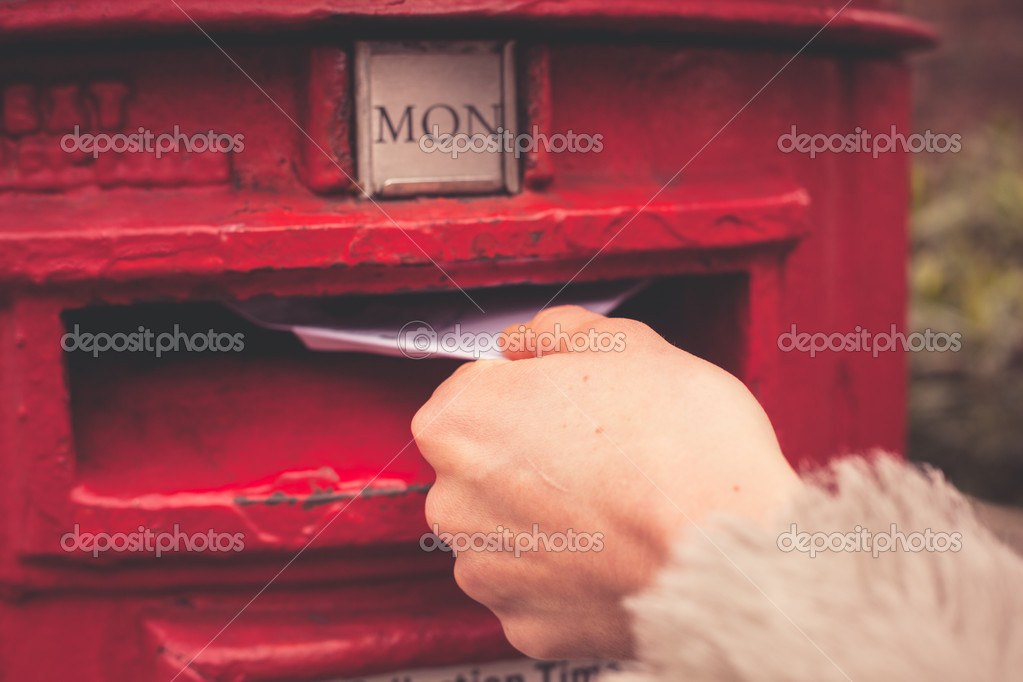 Woman posting letter — Stock Photo © lofilolo #41371189 Woman posting letter — Stock Photo © lofilolo #41371189
