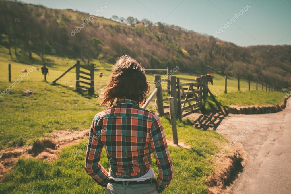 Young woman on a ranch — Stock Photo © lofilolo #45692031