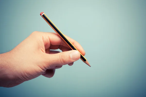 Hand holding pencil Stock Photos, Royalty Free Hand holding pencil ...