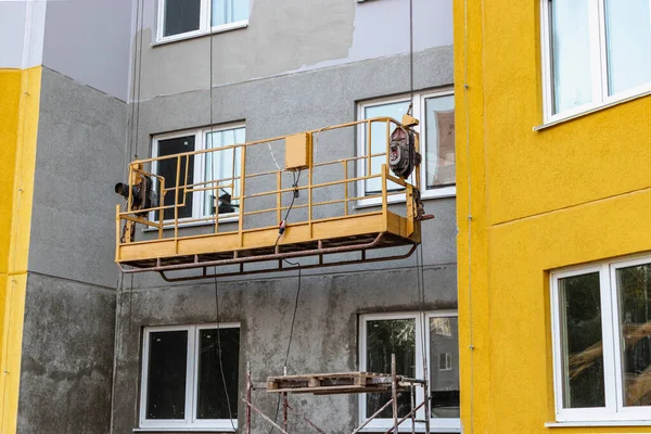 Professional construction cradle or gondola for construction work at ...