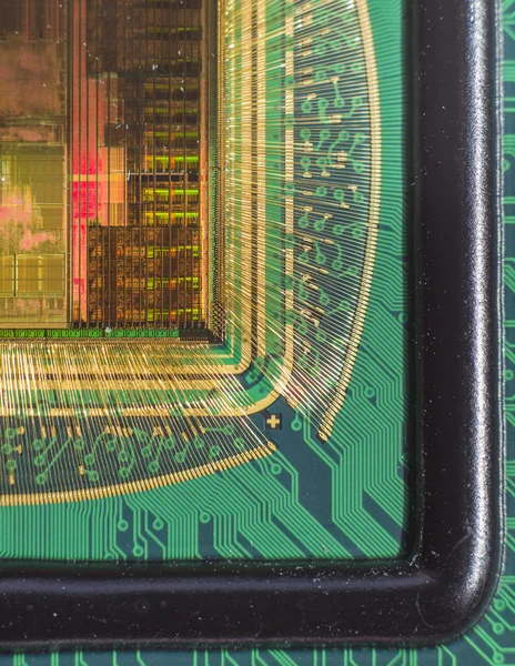 Open computer chip with gold wire connections - Stock Image - Everypixel