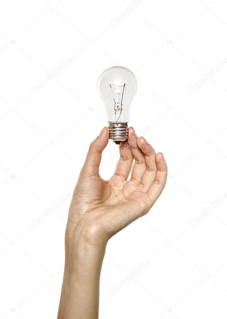 Hand holding a light bulb Stock Photo by ©believeinme 49445821
