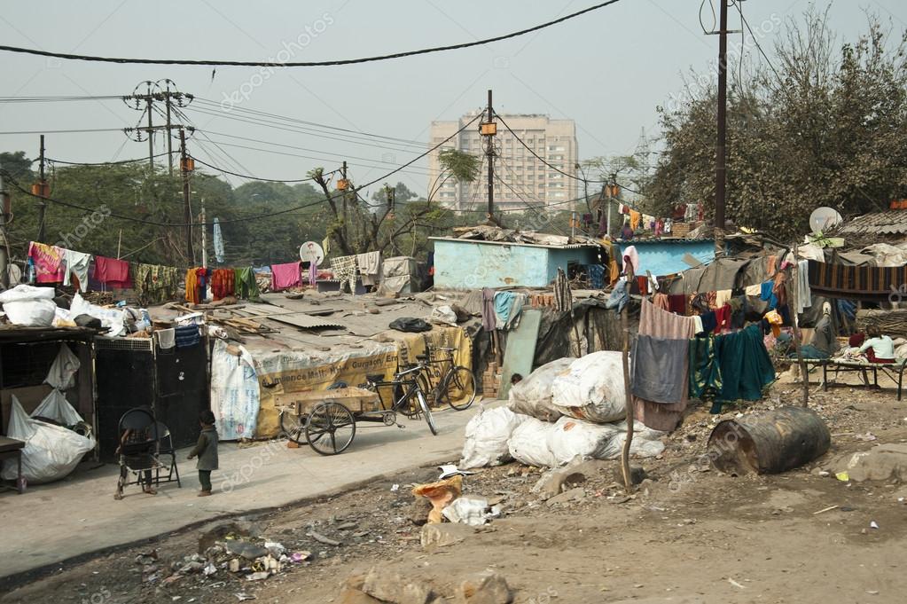 Poor housing in Delhi, India. just near the street where we pass with ...