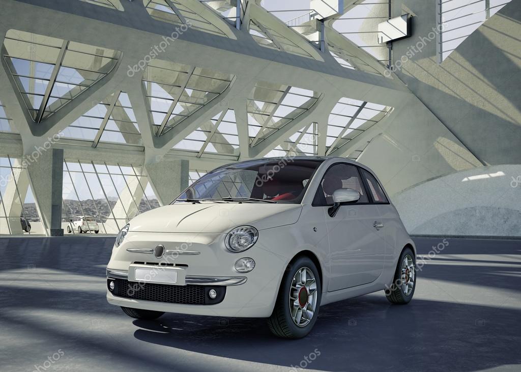 Fiat 500 coche de la ciudad, solo en medio de un enorme edificio ...