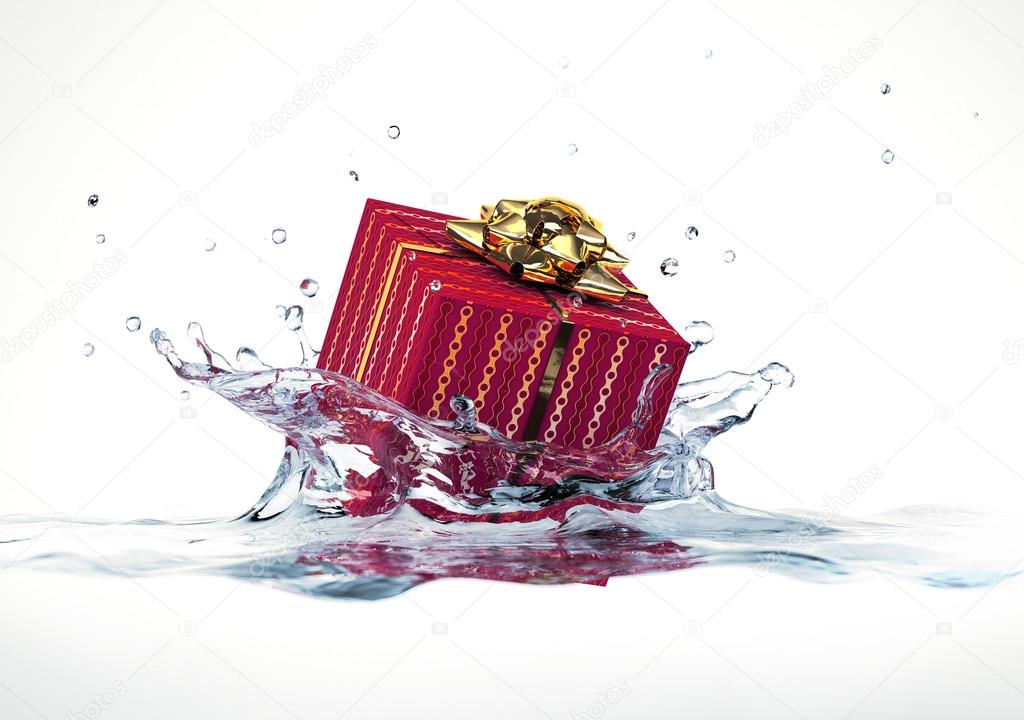 Decorated gift falling into water splashing. Stock Photo by ©Pixelchaos ...