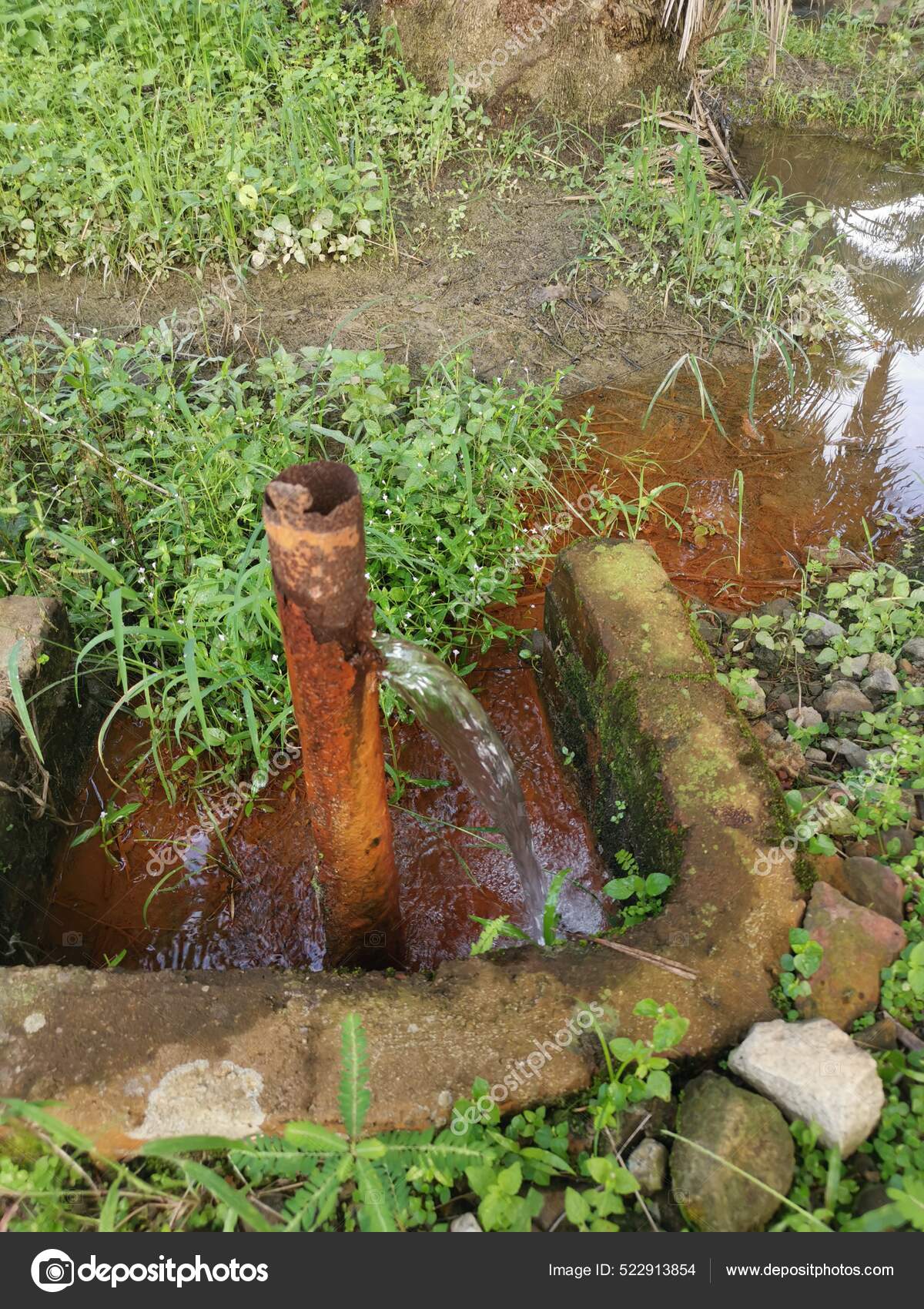 Corroded Water Leakage Pipe Farm Stock Photo by ©sweemingyoung 522913854