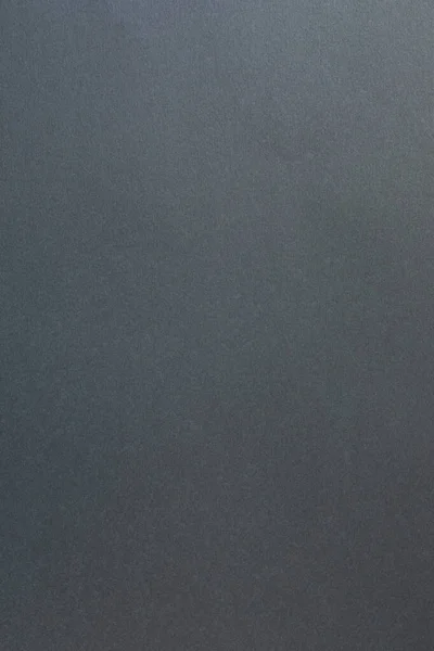 Corrugated black cardboard background for design on an industrial ...