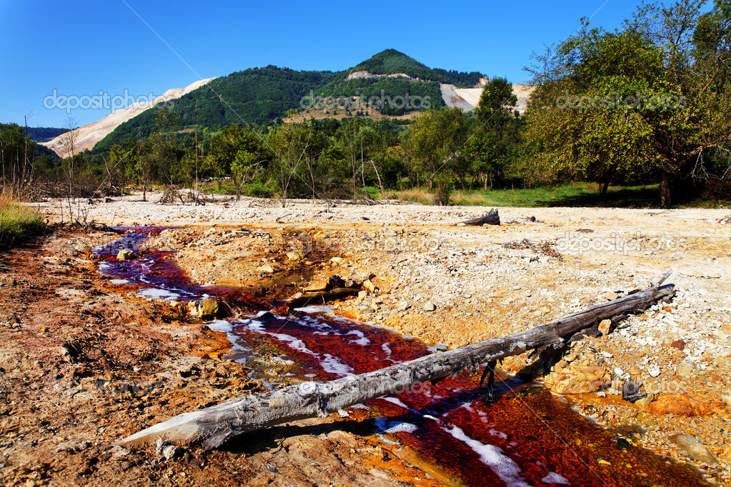 Water pollution of a copper mine exploitation Stock Photo by ...