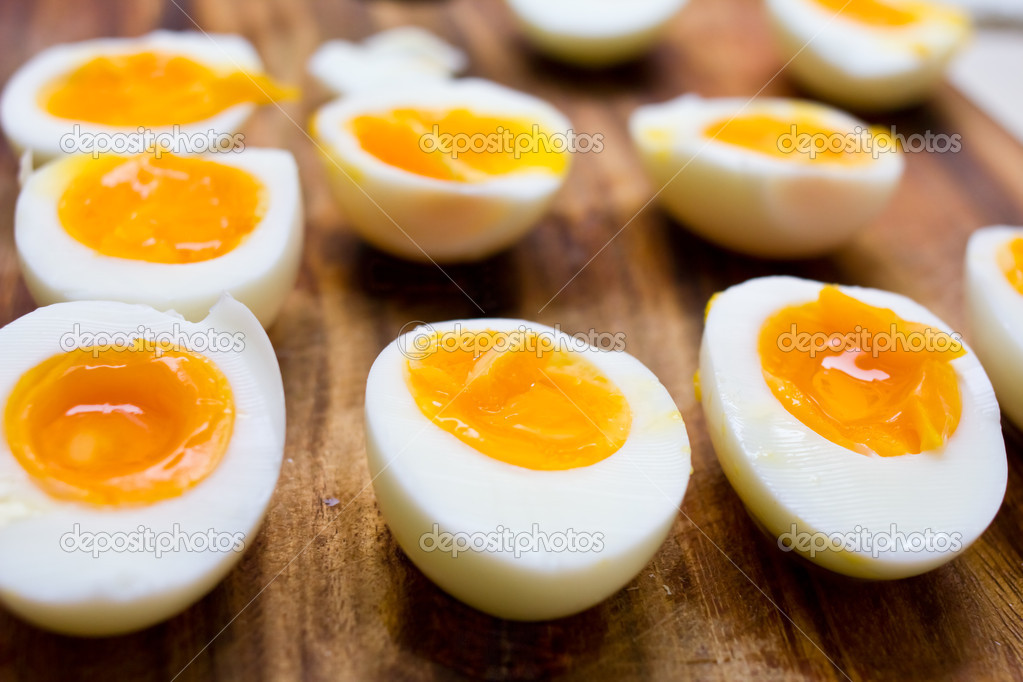 Hard boiled eggs, sliced in halves Stock Photo by ©Zakharova 25965965