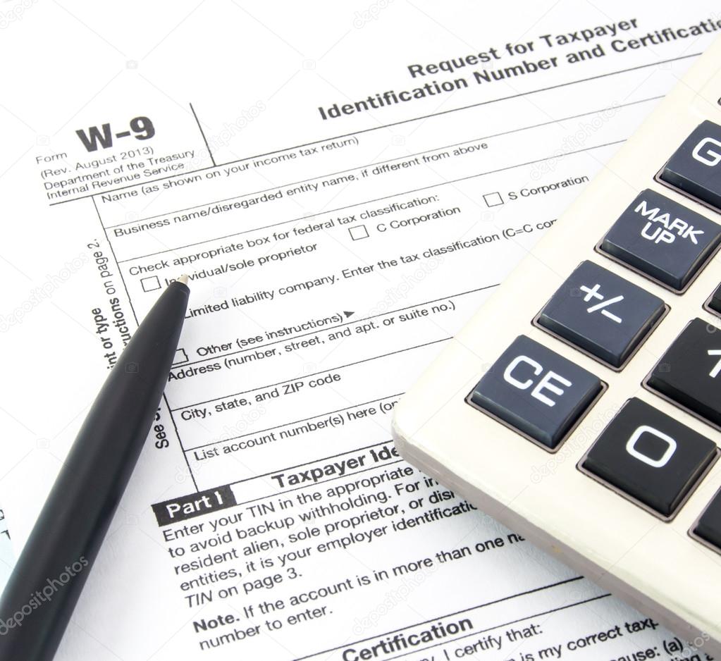 Tax form W-9 and pen — Stock Photo © rakijung #49469141