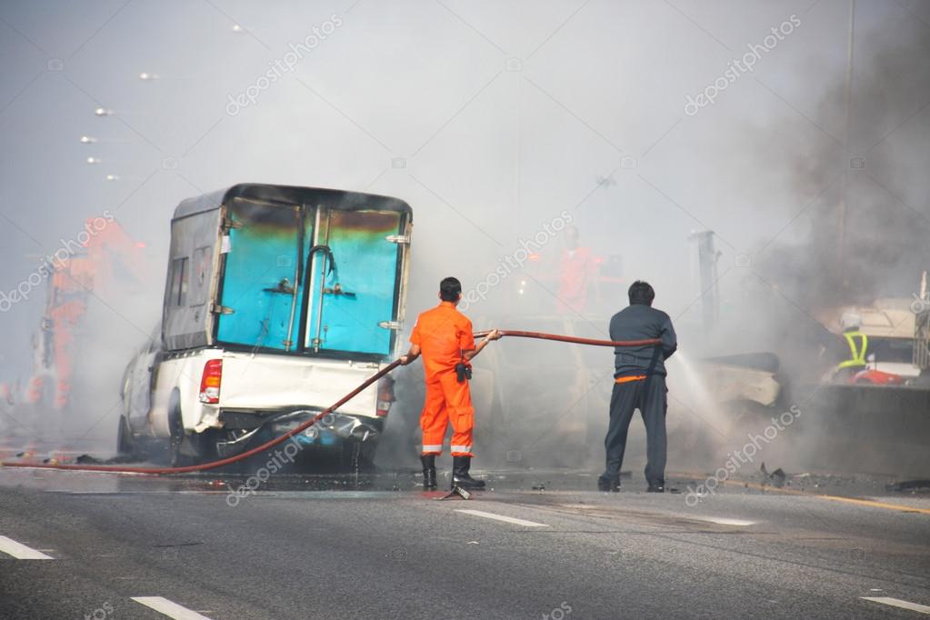 Firefighters fire car crash — Stock Photo © chartcameraman #41106773