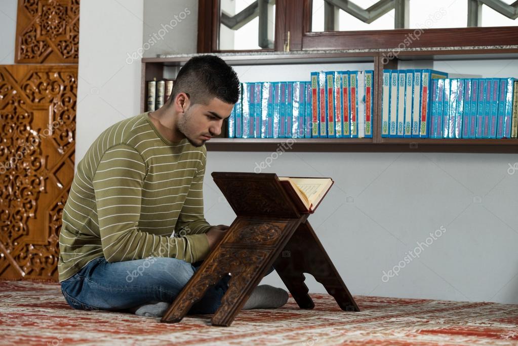 Arabic Muslim Man Reading Holy Islamic Book Koran Stock Photo by ©ibrak ...