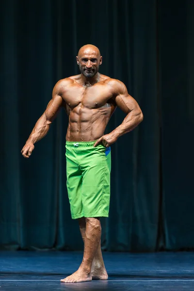 Bodybuilder On A competition For The Win - Stock Image - Everypixel