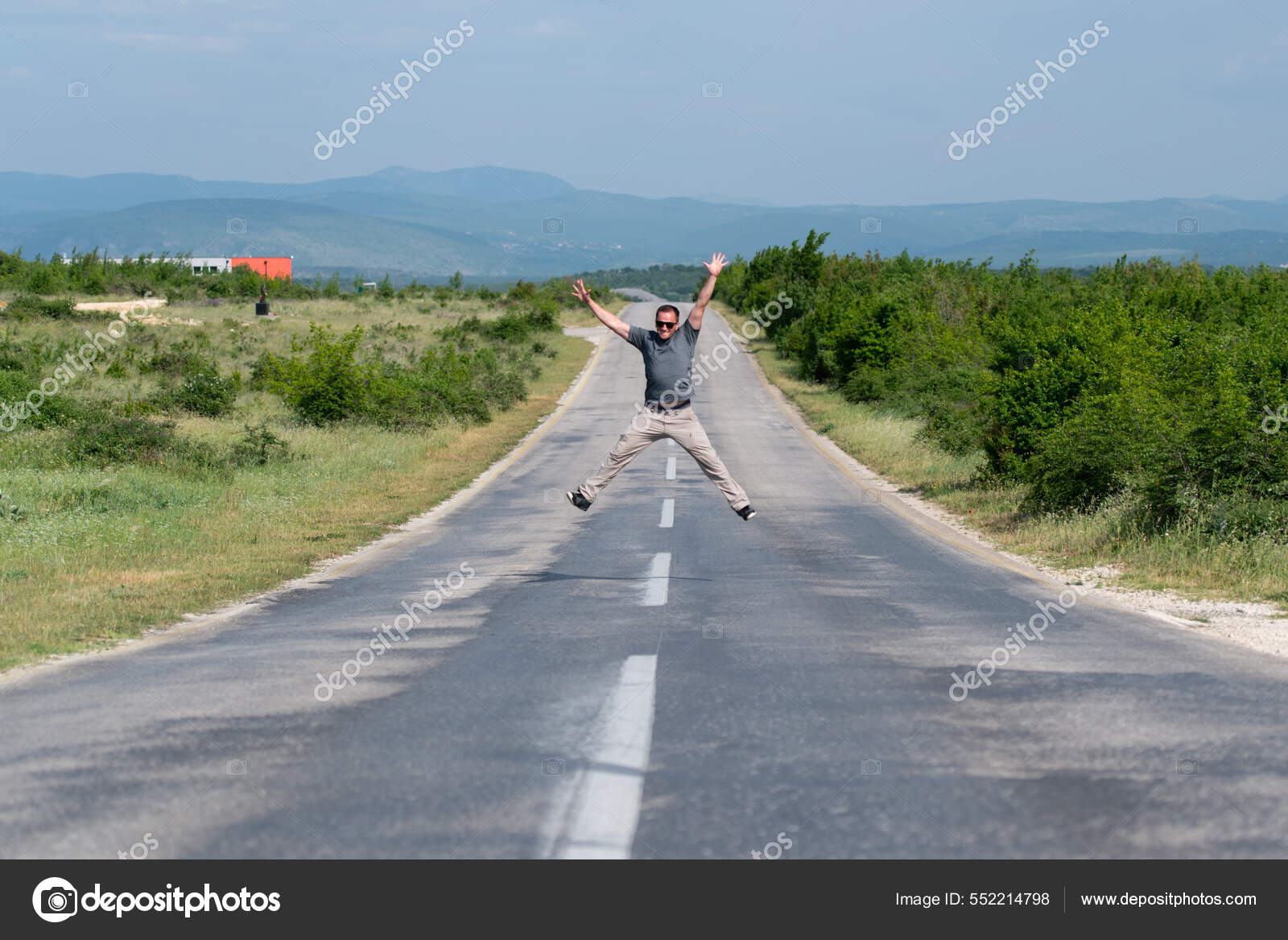 Handsome Man Jumping Street Highway Having Fun Outdoors Stock Photo by ...