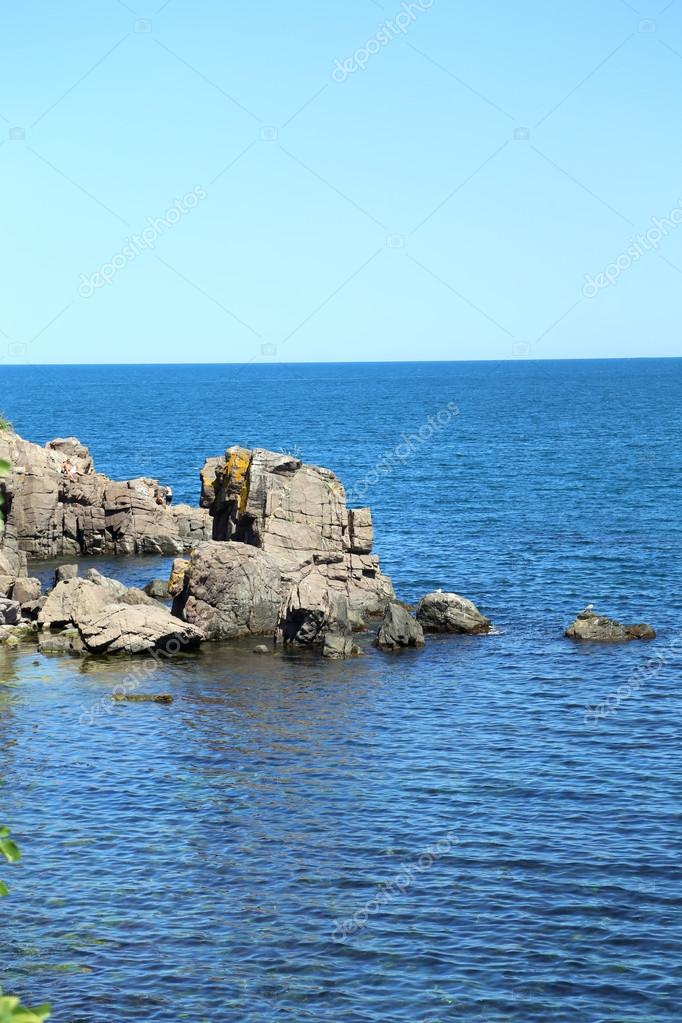 White rocks on the black sea. — Stock Photo © indigolotos #35245503