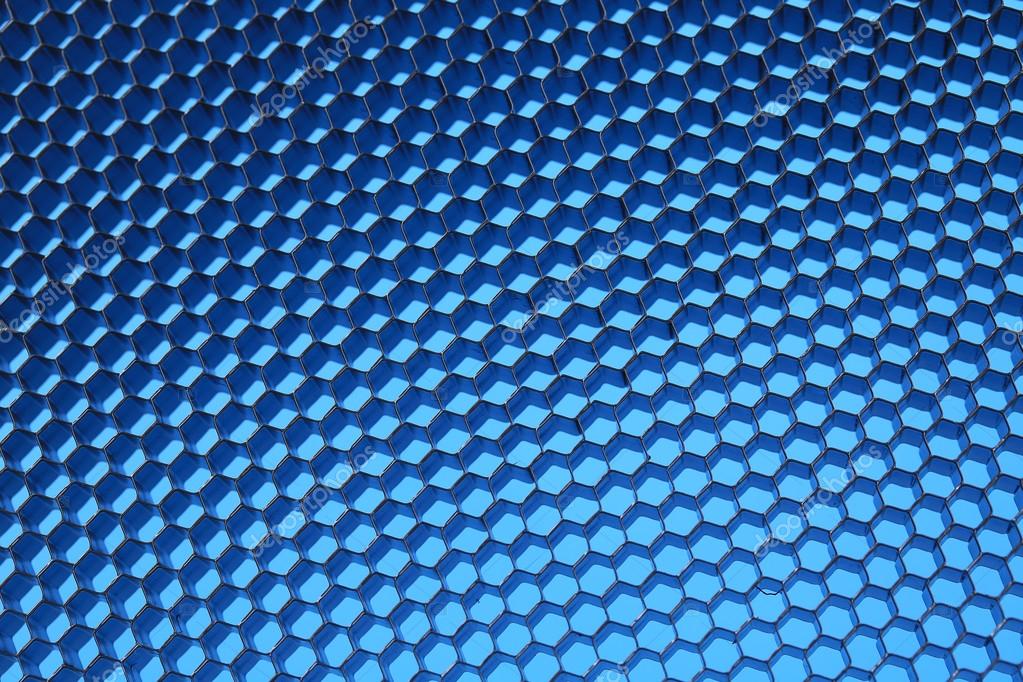 Hexagonal mesh on a blue background. Stock Photo by ©indigolotos 45659875